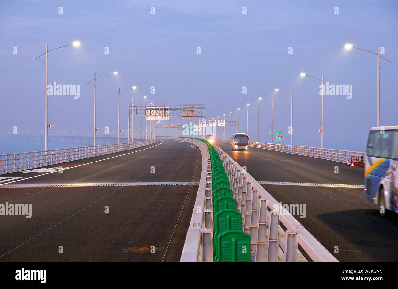 --FILE--Cars drive on the world's longest cross-sea bridge, the Hong ...