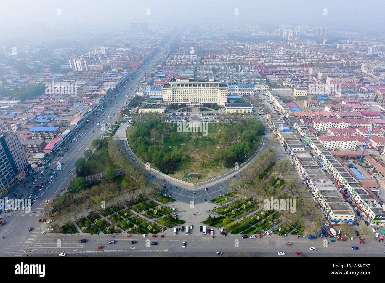 --FILE--Aerial view of the Xiongxian county government building in ...