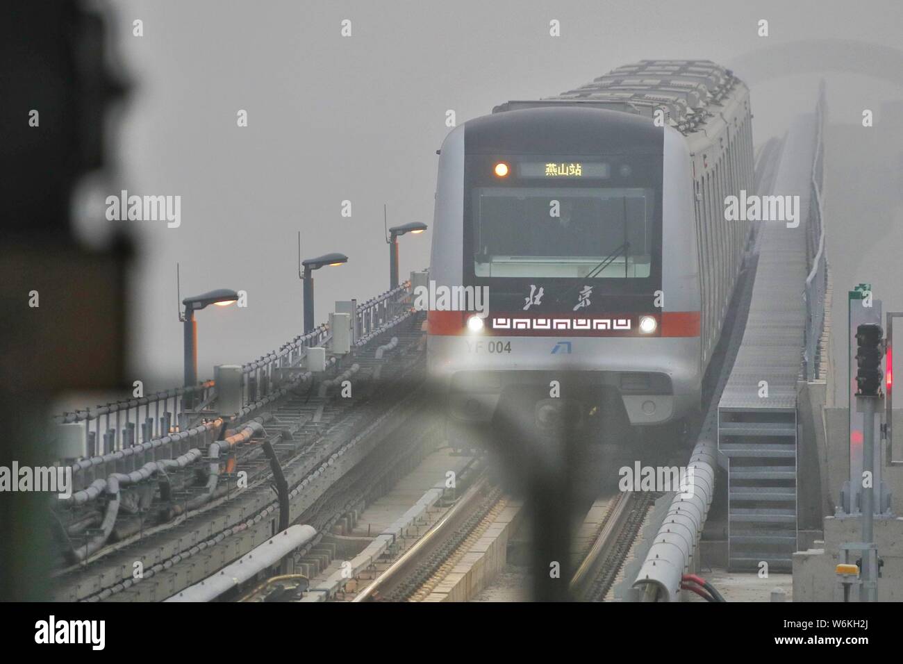 A subway train runs on China's first fully automated metro line, the ...