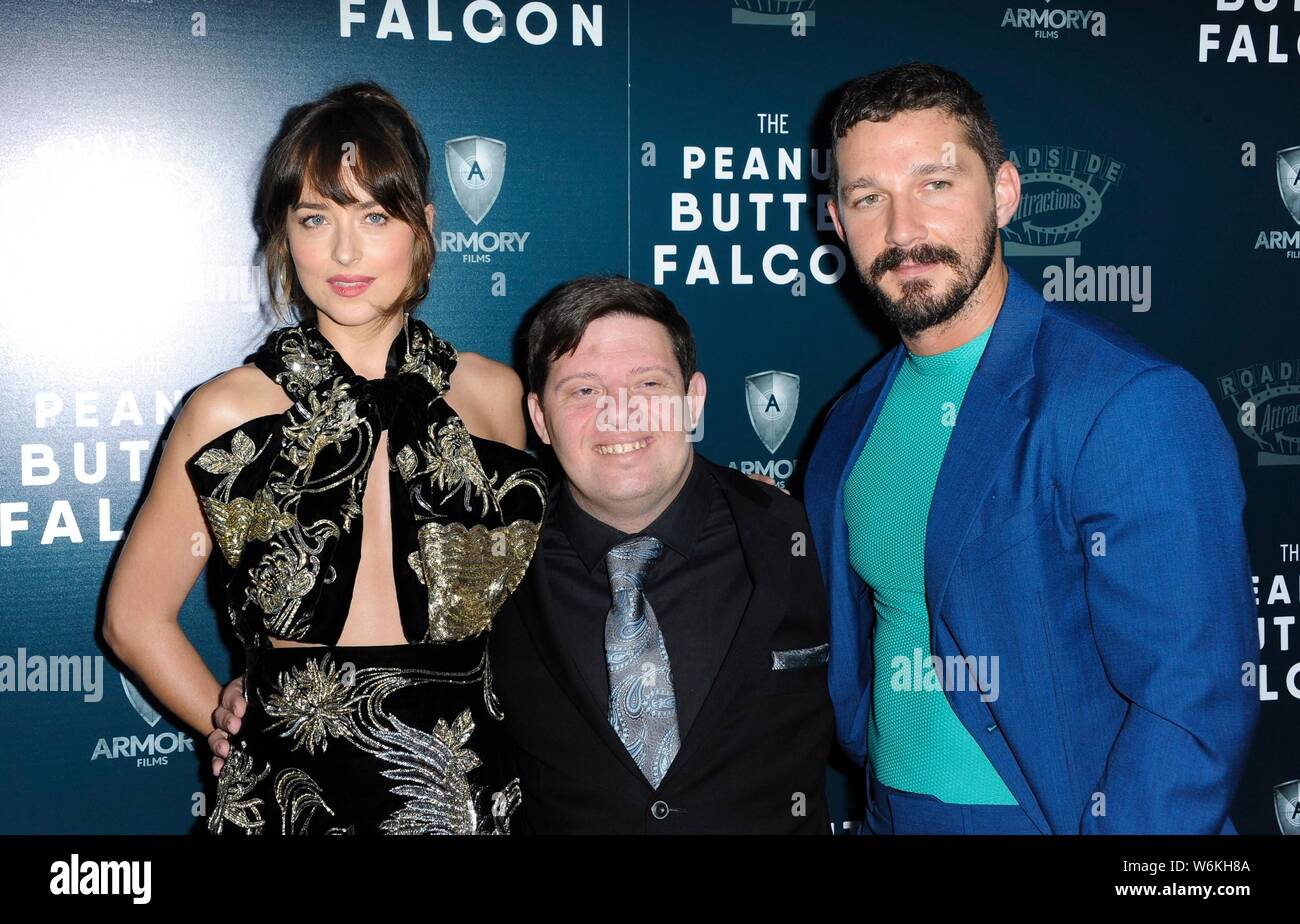 Los Angeles, CA. 1st Aug, 2019. Dakota Johnson, Zack Gottsagen, Shia ...