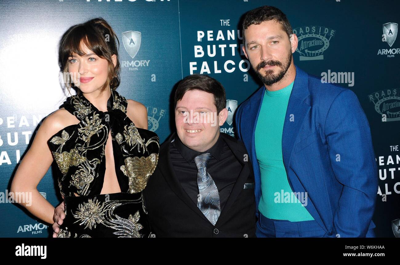 Los Angeles, CA. 1st Aug, 2019. Dakota Johnson, Zack Gottsagen, Shia ...