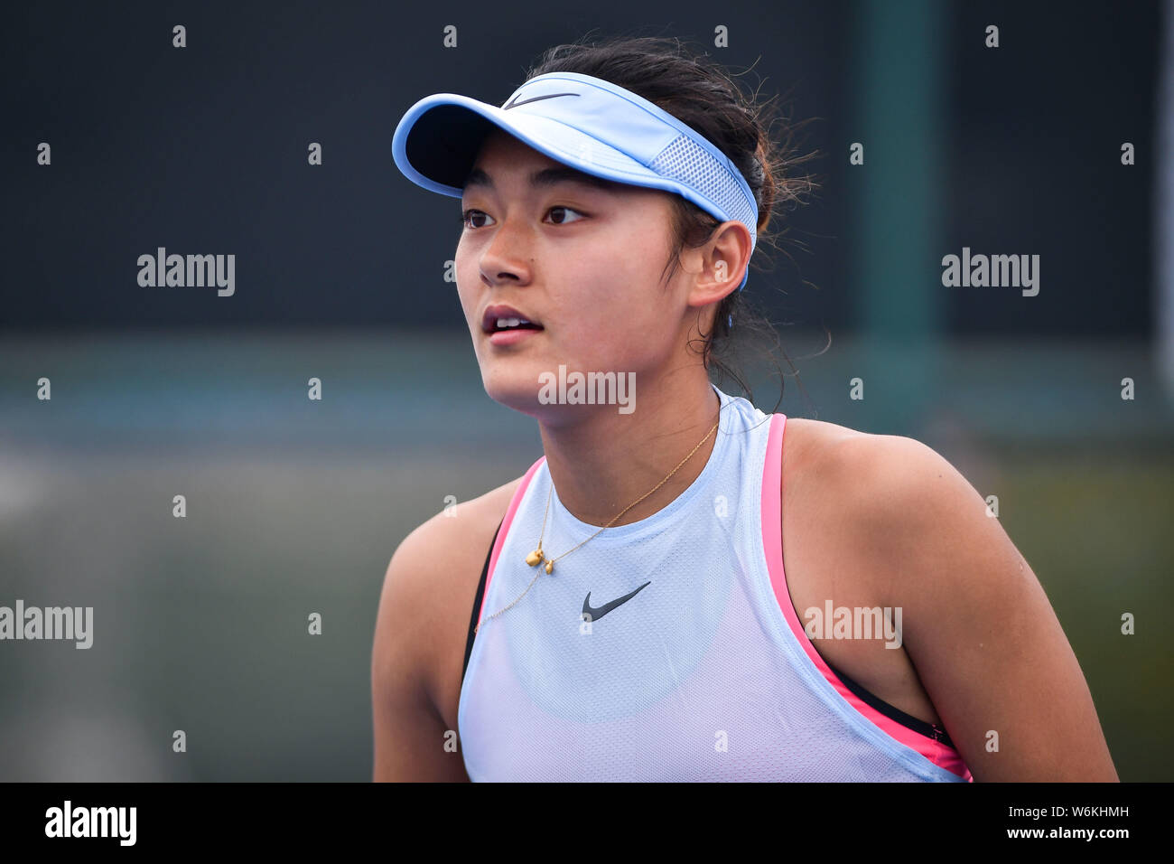Wang Yafan of China reacts as she competes against Jasmine Paolini of ...
