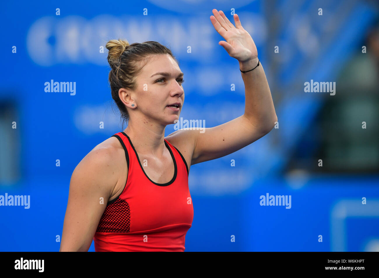 Simona Halep of Romania reacts after defeating Aryna Sabalenka of ...