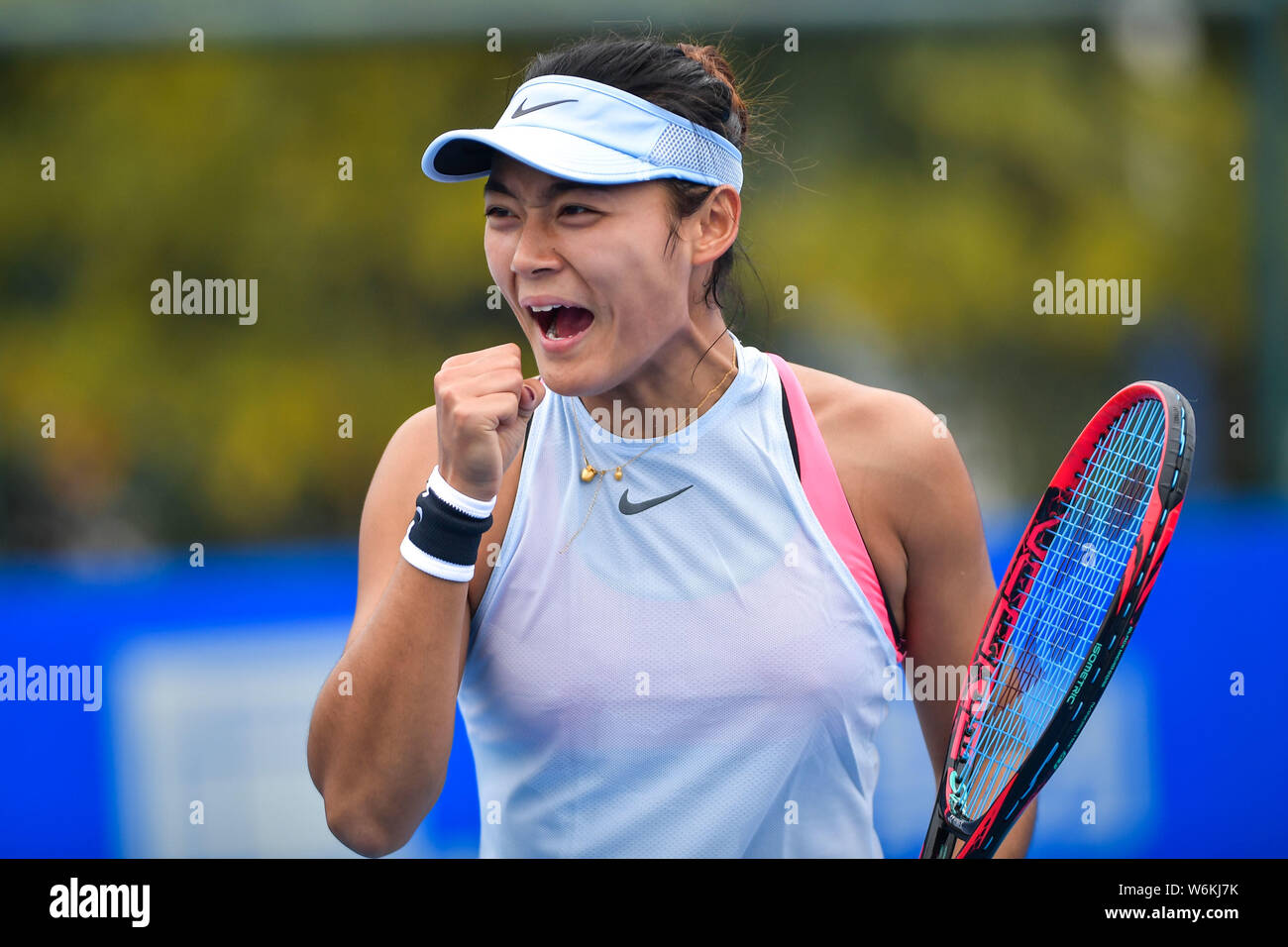 Wang Yafan of China poses to celebrate after scoring against Jasmine ...