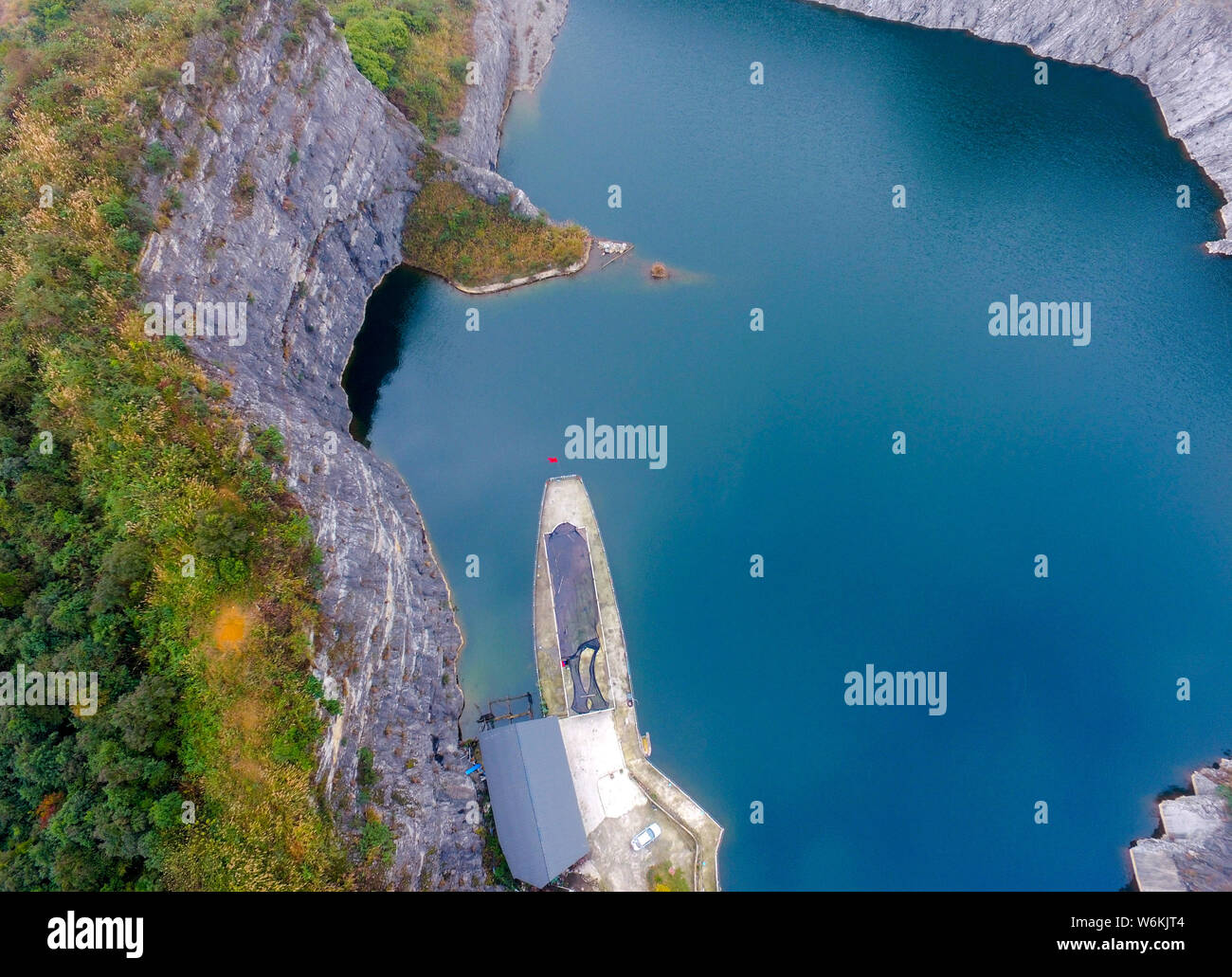 View of a heart-shape pond which was once a stone quarry, abandoned ...
