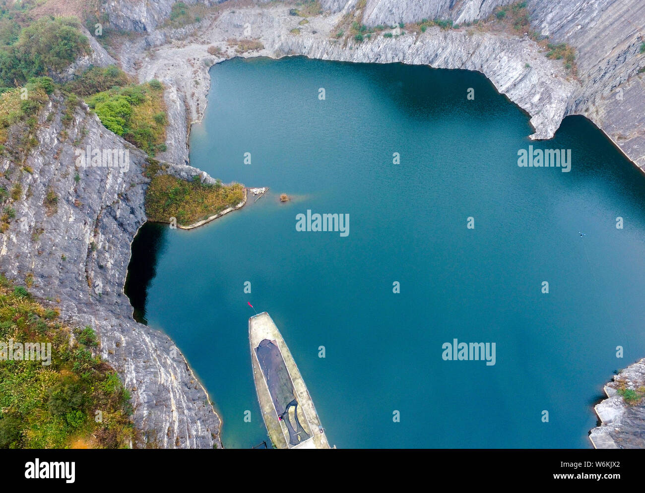 View of a heart-shape pond which was once a stone quarry, abandoned ...