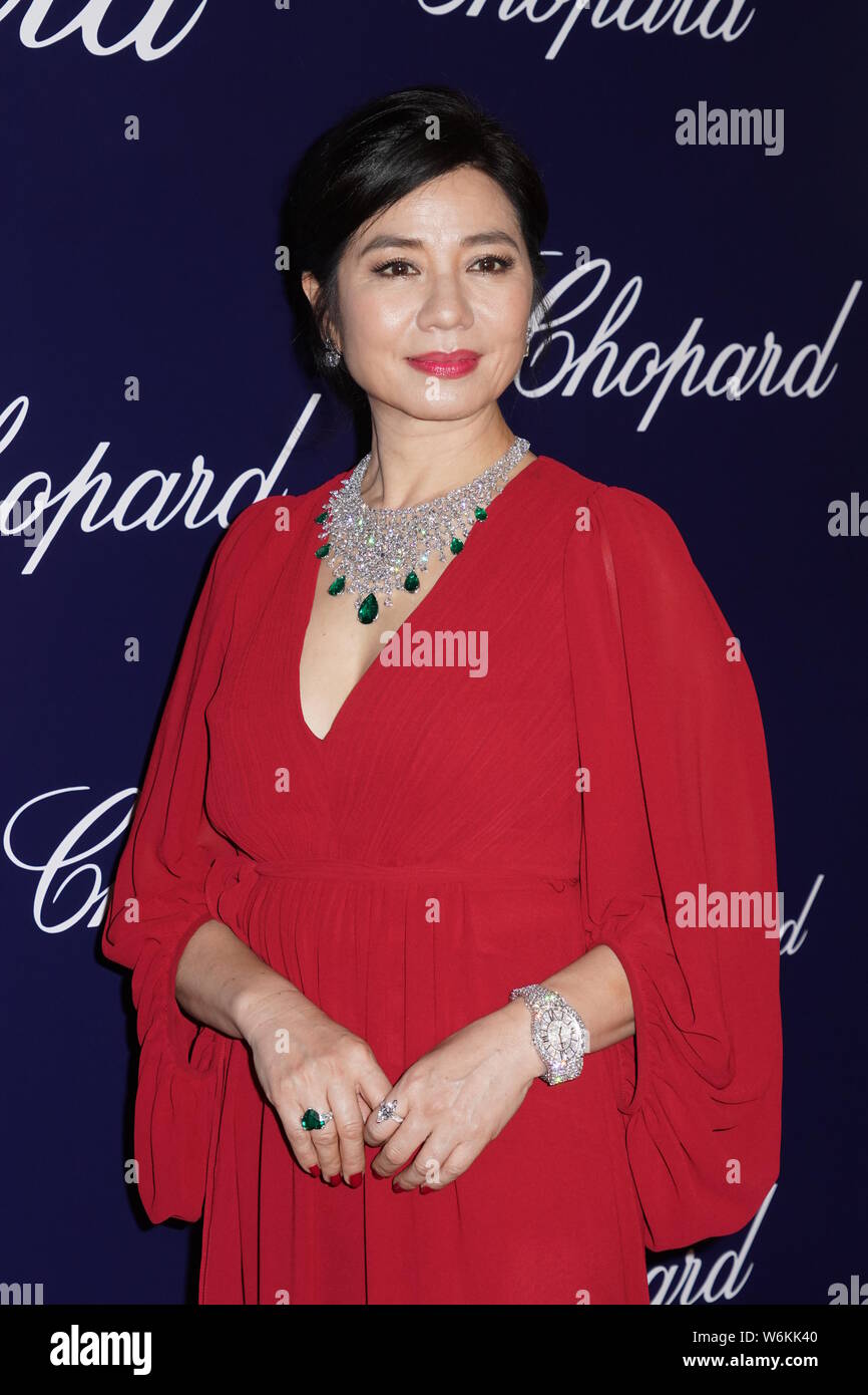 Hong Kong film actress Cherie Chung poses during a promotional event for Swiss jewellery brand ...