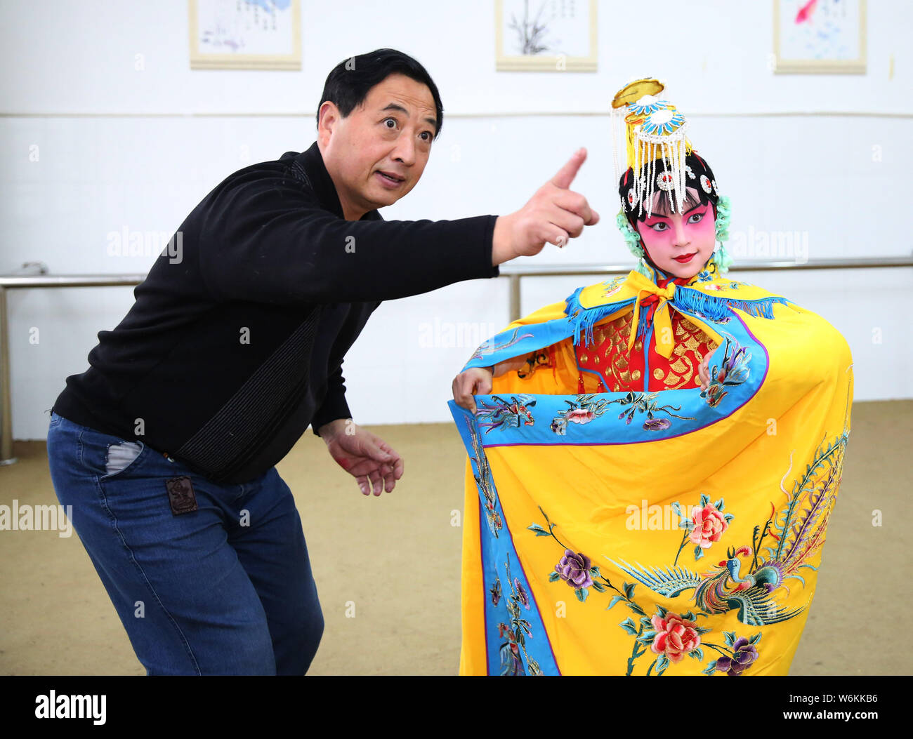 A pupil wearing Chinese Beijing Opera or Peking Opera costumes ...