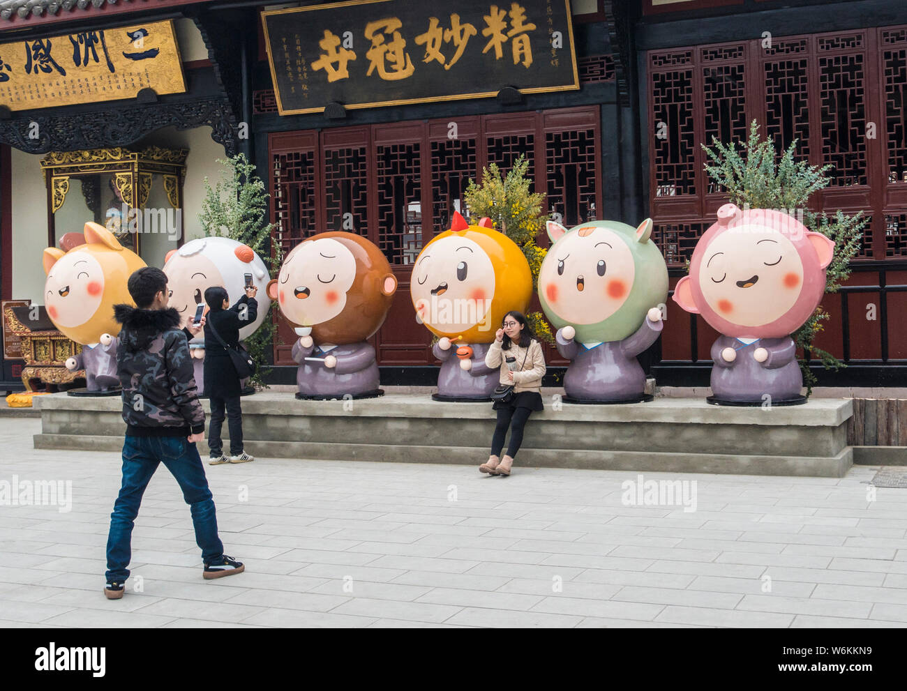 Visitors pose for photos with lovely sculptures featuring the shapes of ...
