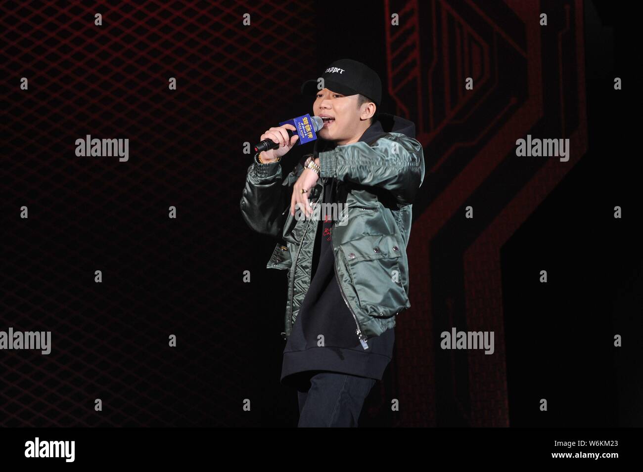 --FILE--Chinese rapper Wang Hao, better known as PG One, performs at a ...