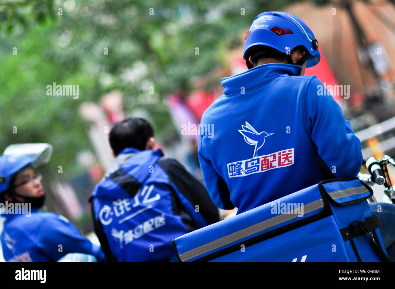 --FILE--Deliverymen of Chinese meal delivery company Ele.me wait for ...