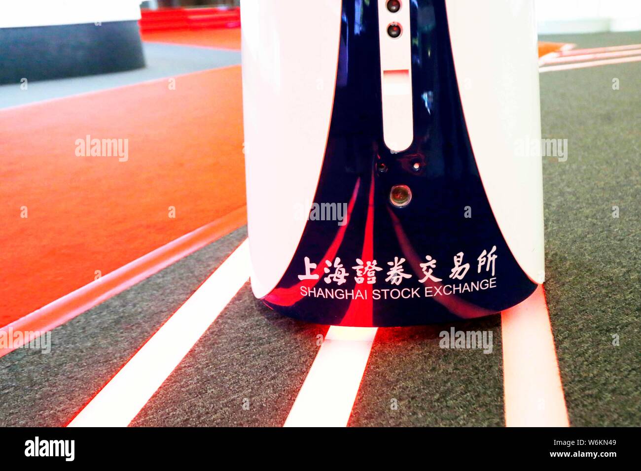 The artificial intelligent (AI) robot Zhen Zhen serves visitors at the ...