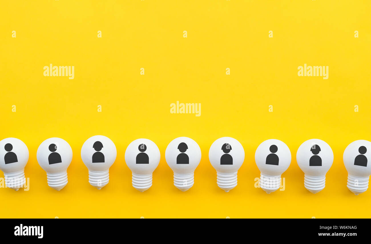Teamwork concepts with human icon on group of lightbulb on pastel color ...