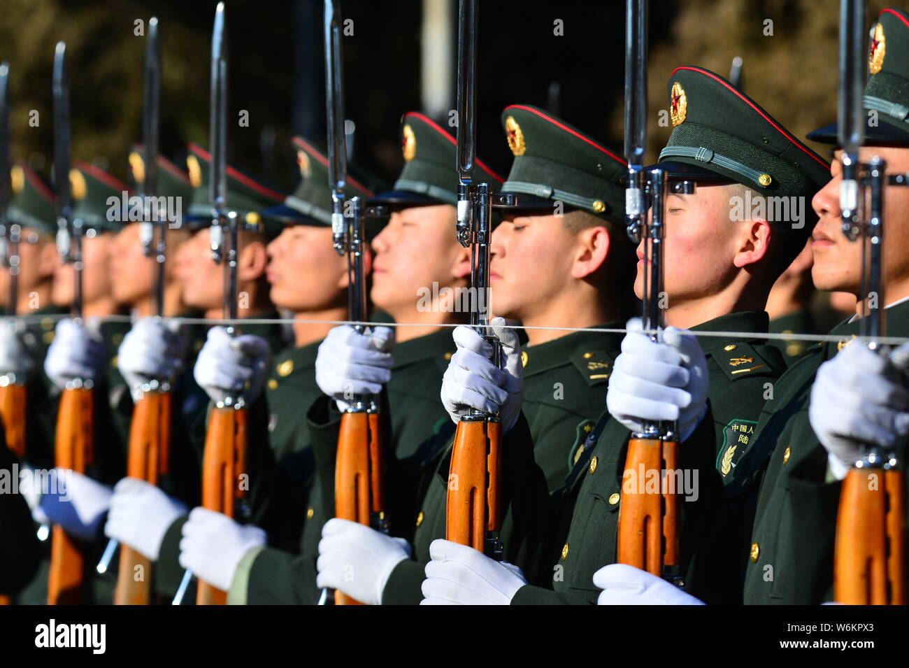 The Guard of Honor of the Chinese People's Liberation Army (PLA) take ...