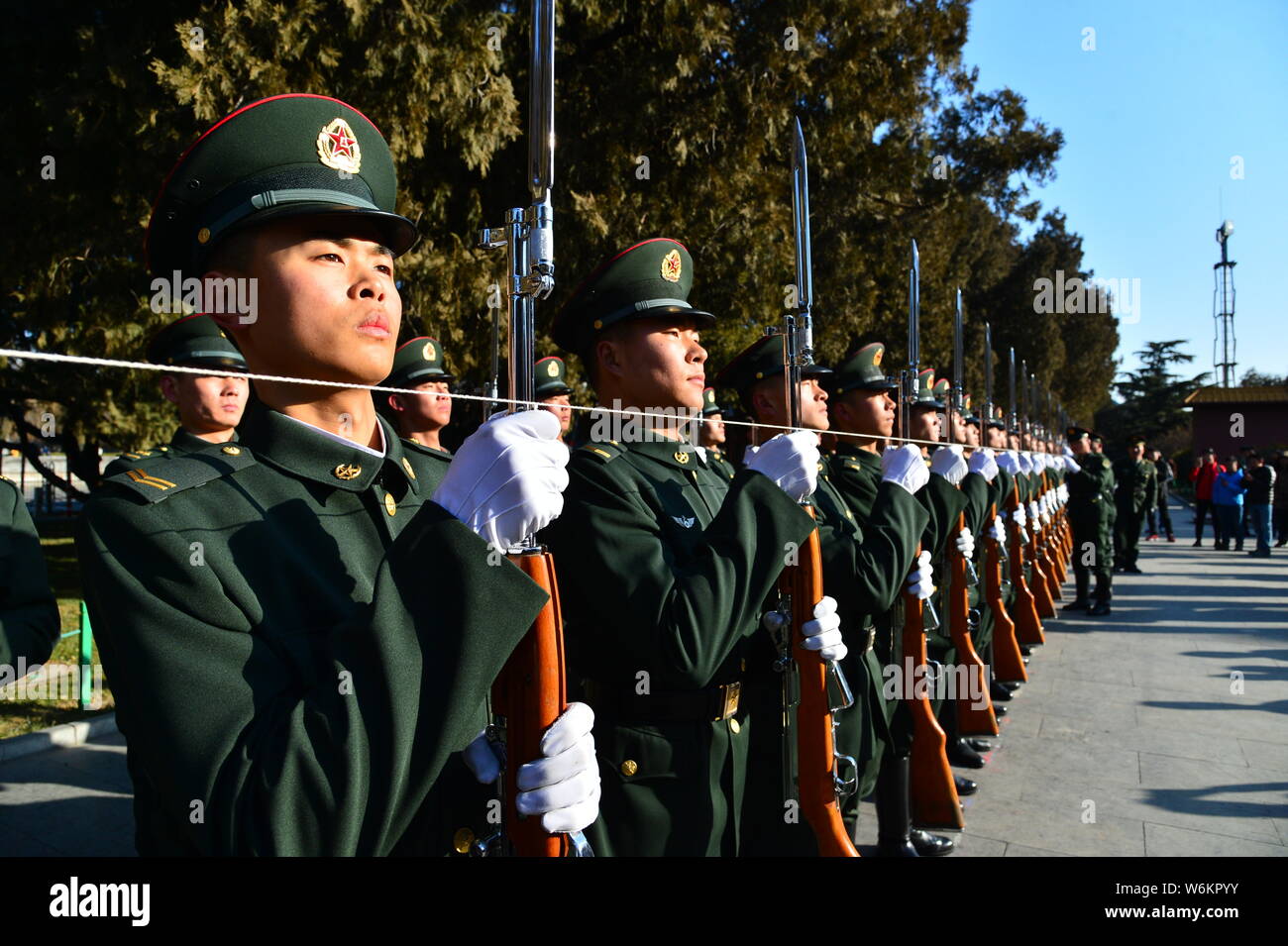 The Guard of Honor of the Chinese People's Liberation Army (PLA) take ...