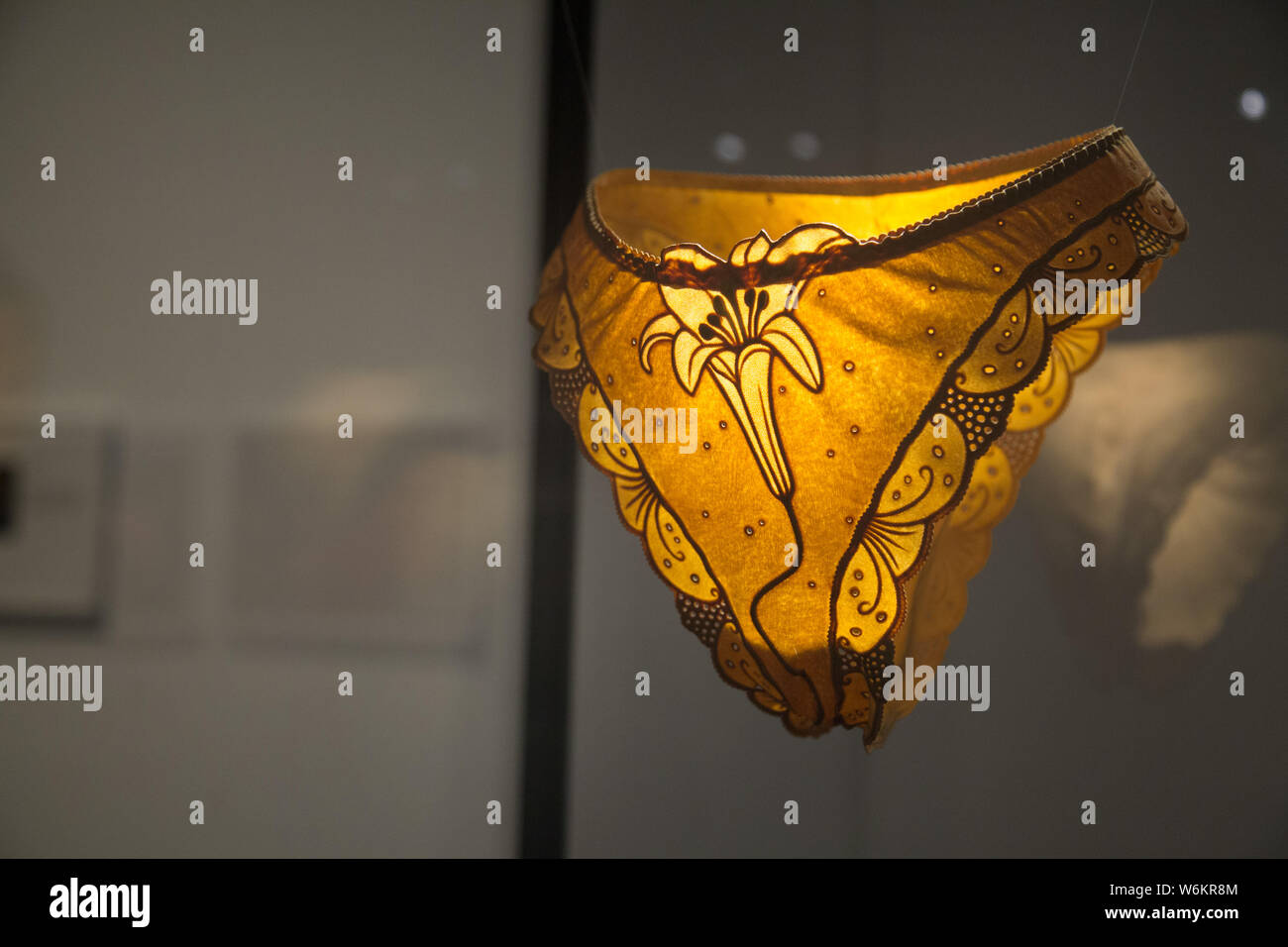 The wood artwork "Woman Walking" created by Taiwanese sculptor Wu Ching ...