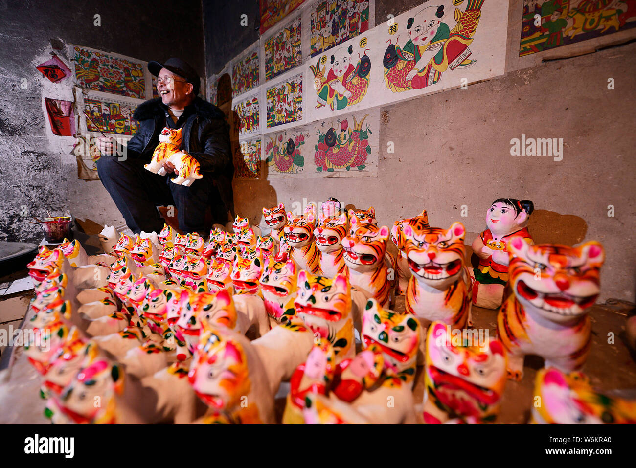 70-year-old Chinese craftsman Wei Zhaozhong makes the painted clay ...
