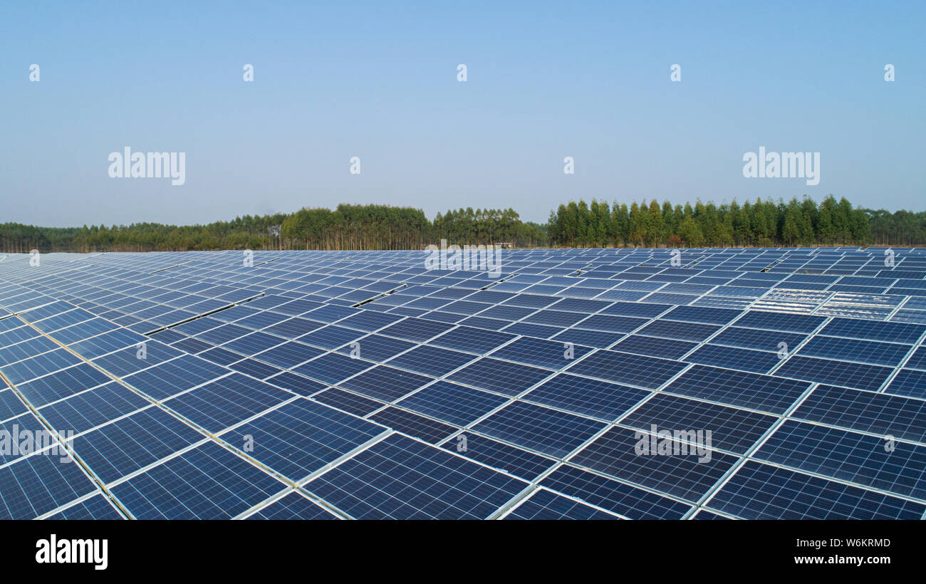 --FILE--Solar panels are installed at a photovoltaic (PV) power plant ...
