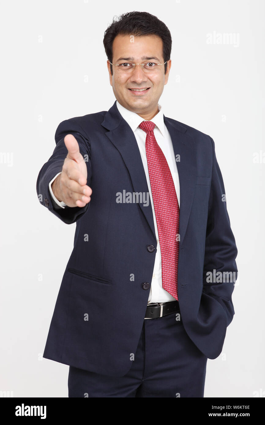 Businessman reaching out hand handshake hi-res stock photography and ...