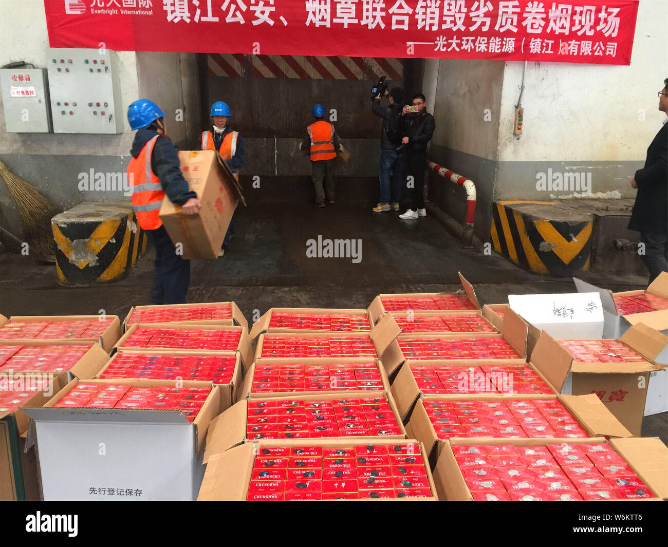 Chinese police officers check 2,333 cartons of counterfeit Zhonghua ...