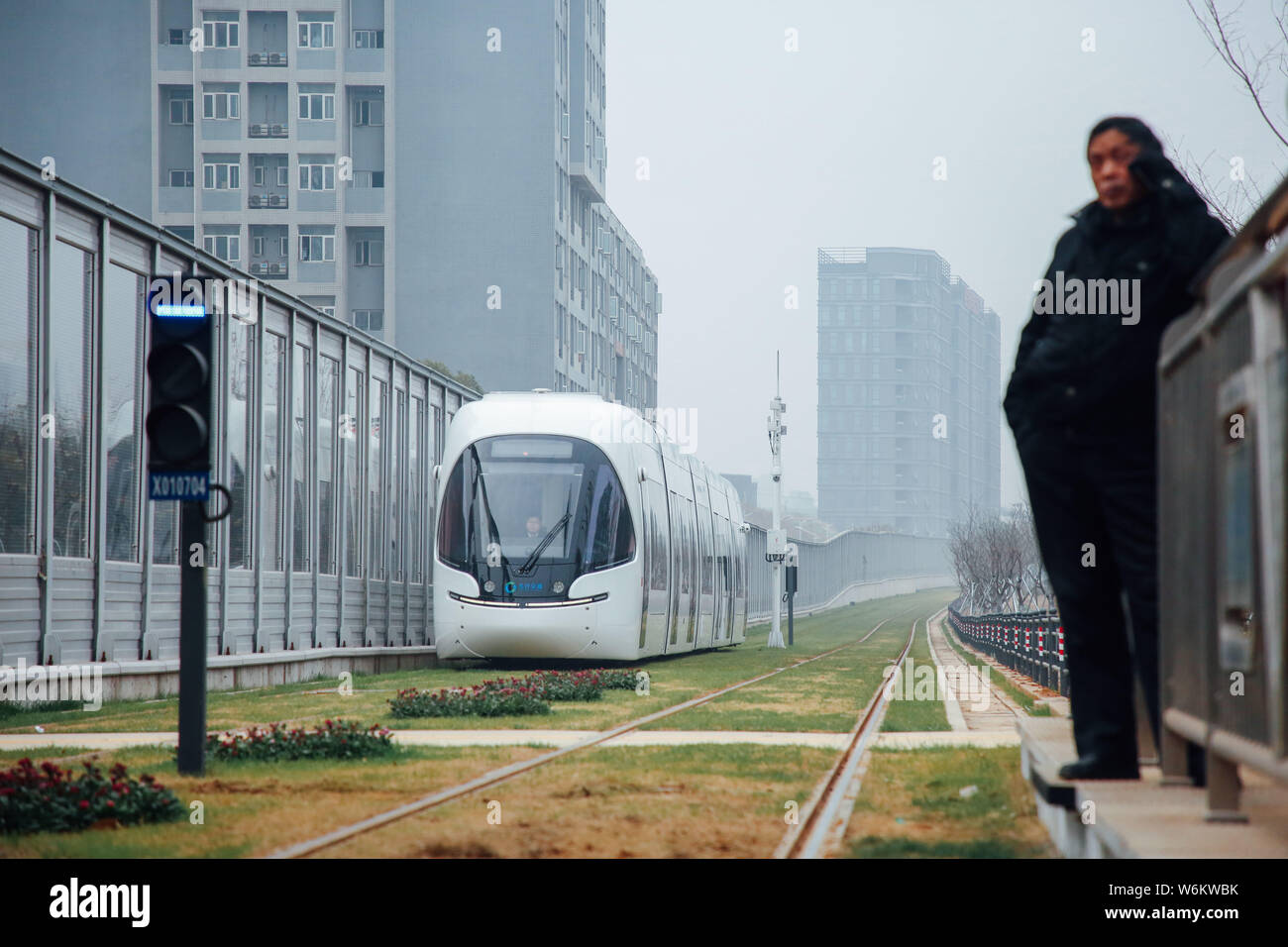 An "Optics Valley Quantum" tram runs during the trial operations of two ...