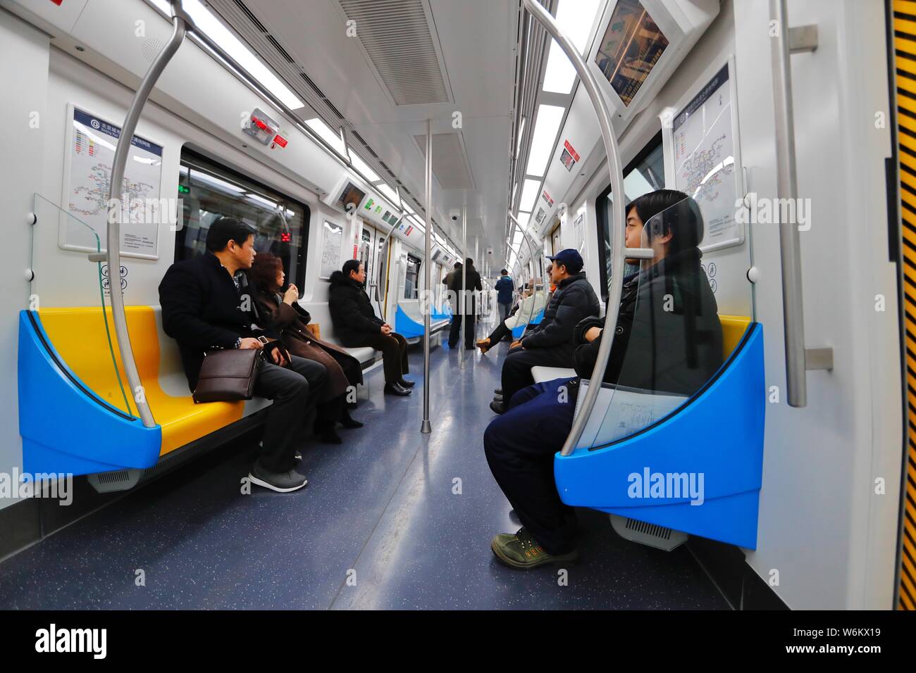 Local residents take a subway station on China's first fully automated ...