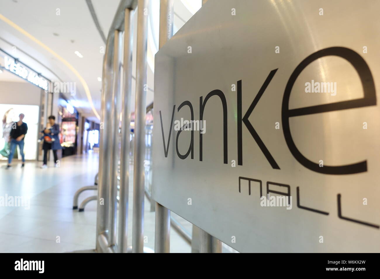 --FILE--A logo of Vanke is pictured at the Vanke shopping mall in ...
