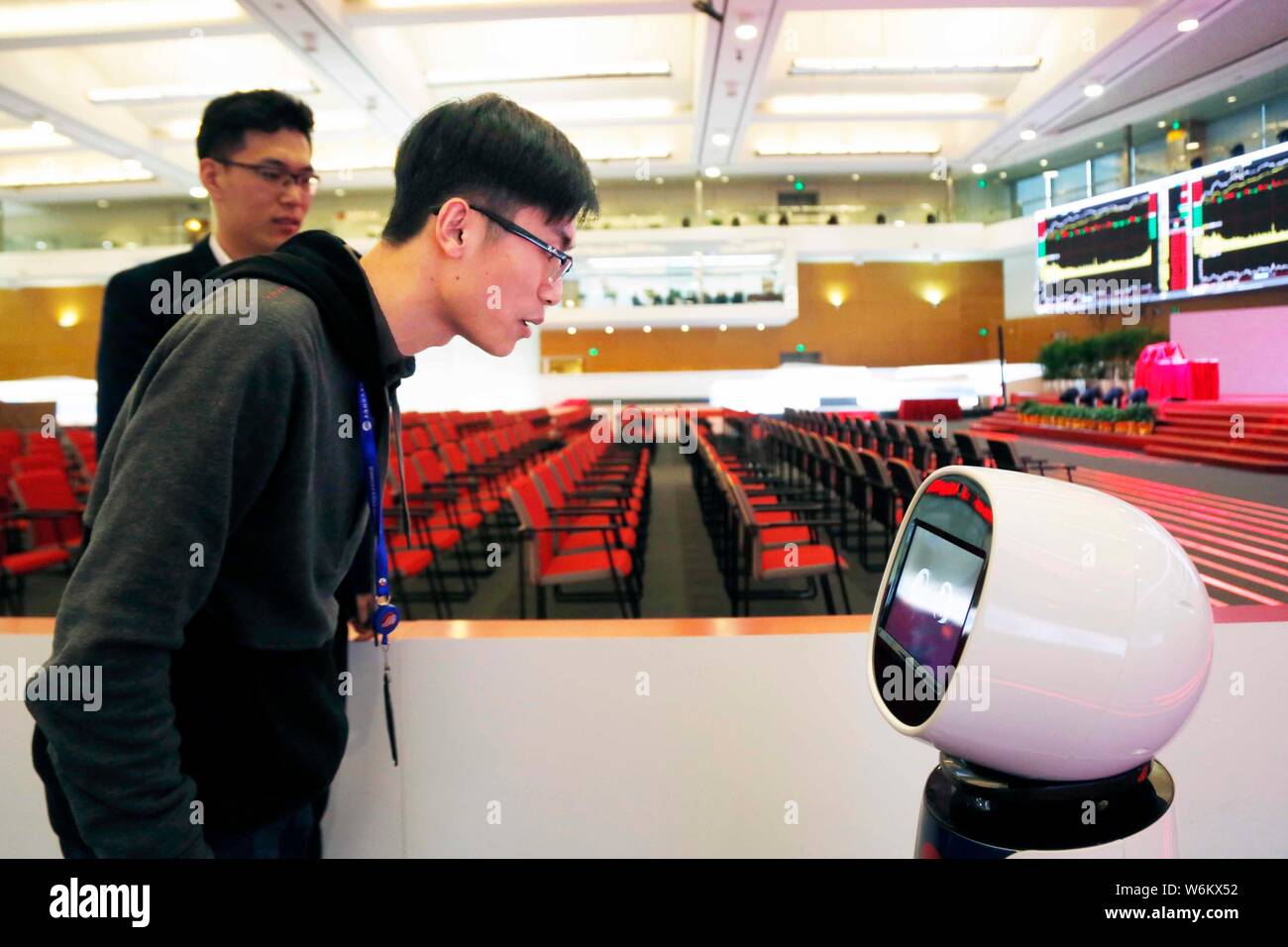 The artificial intelligent (AI) robot Zhen Zhen talks with visitors at ...