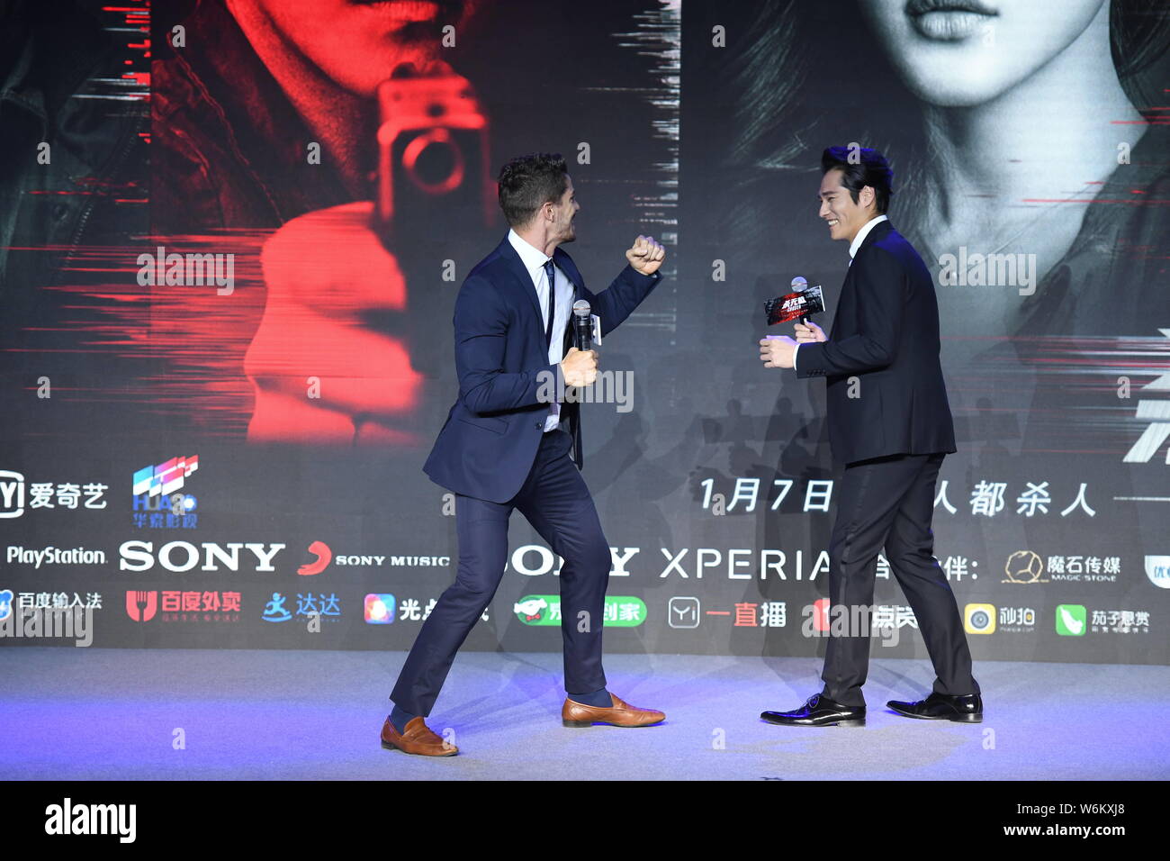 Taiwanese actor Lan Cheng-lung, right, and Australian actor Sam Hayden ...