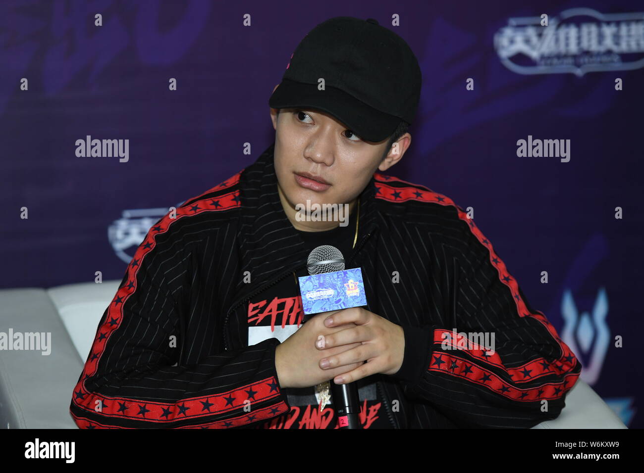--FILE--Chinese rapper Wang Hao, better known as PG One, reacts during ...
