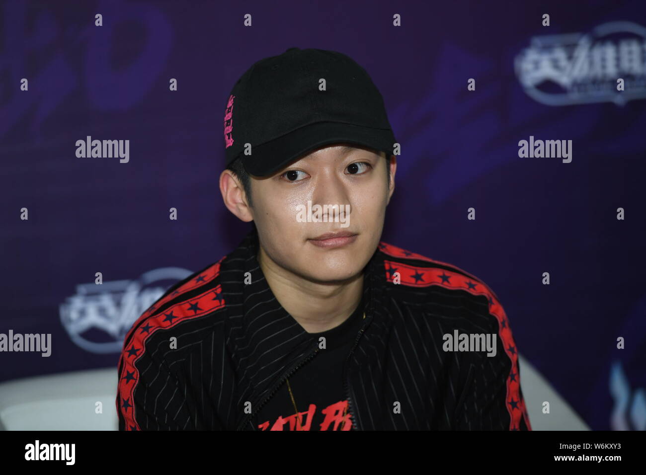 --FILE--Chinese rapper Wang Hao, better known as PG One, reacts during ...