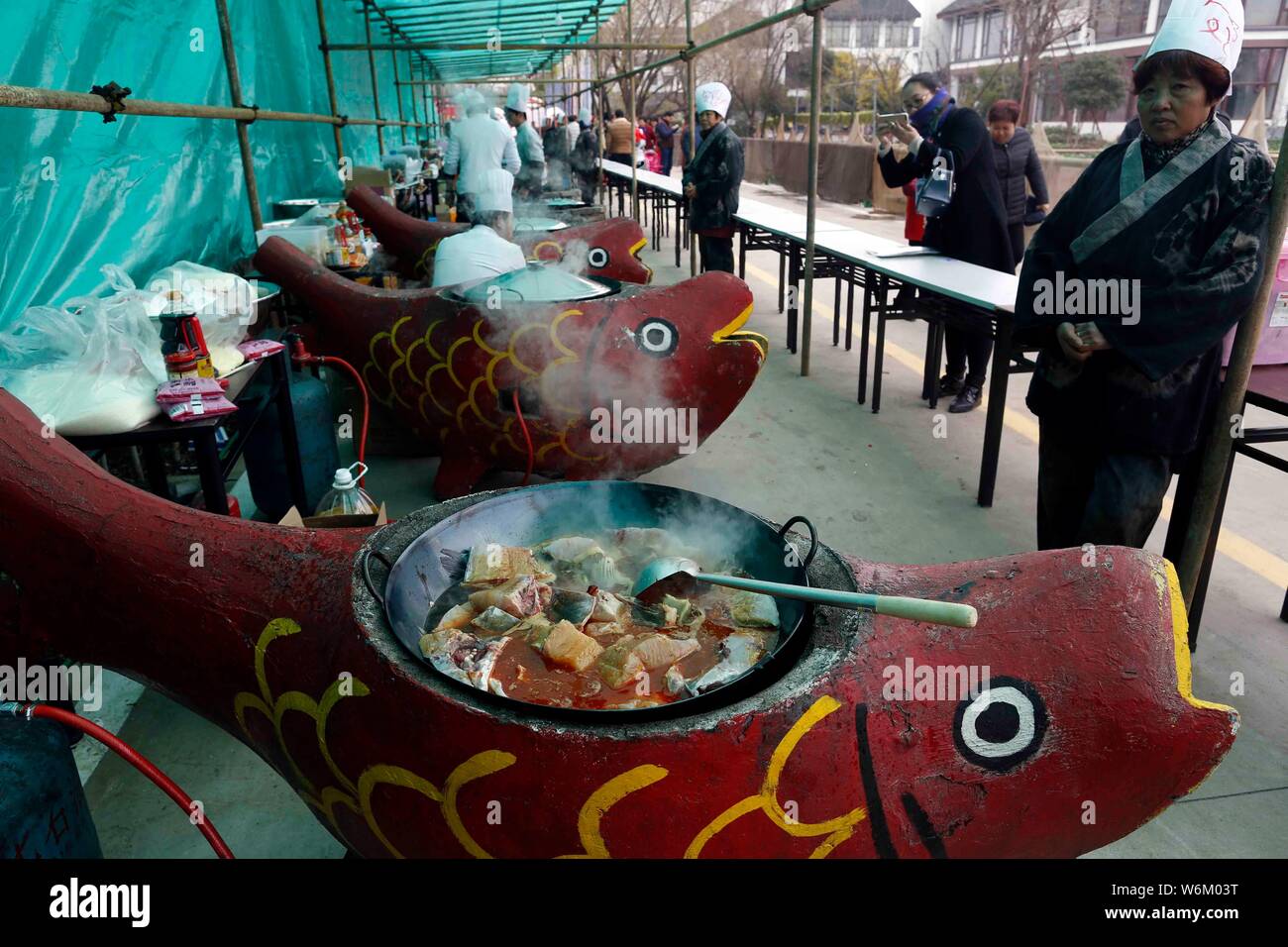 Chinese chefs cook up fish dishes during the ninth Fishing and Cultural ...