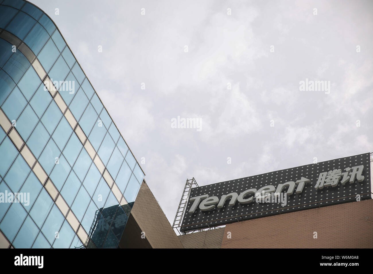 --FILE--View of a signboard of Tencent on the rooftop of an office ...