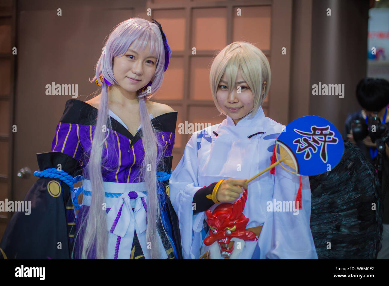 --FILE--Chinese cosers dressed in cosplay costumes pose during the 6th ...