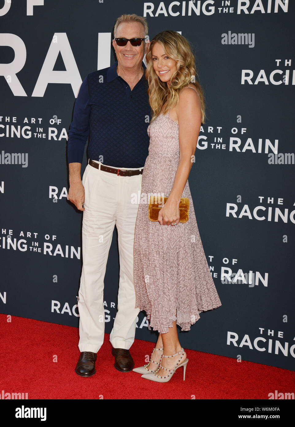 Los Angeles, USA. 02nd Aug, 2019. Kevin Costner, Christine Baumgartner ...