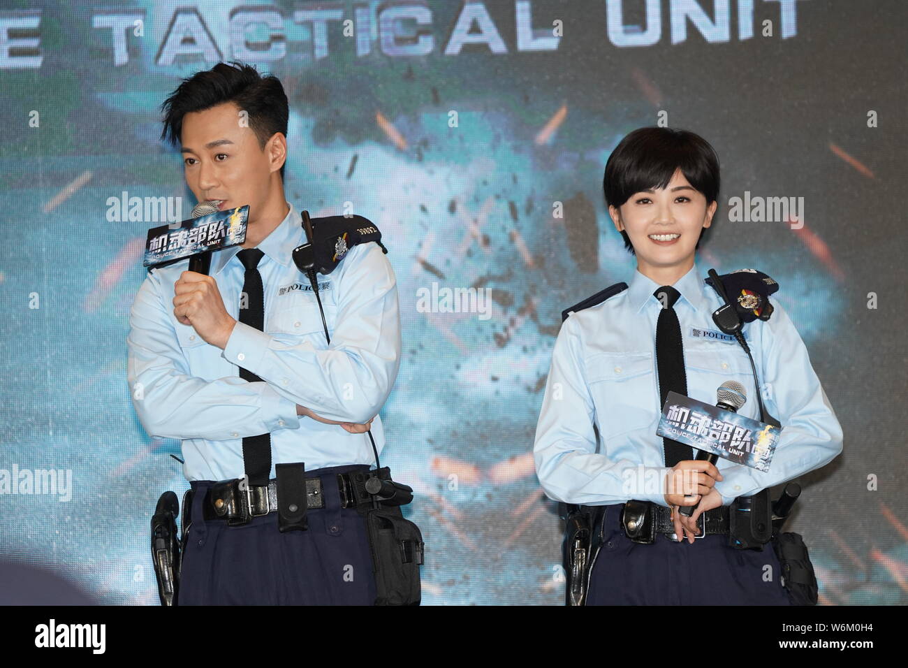 Hong Kong singers and actor Raymond Lam, left, and actress Charlene Choi of Hong Kong pop duo ...