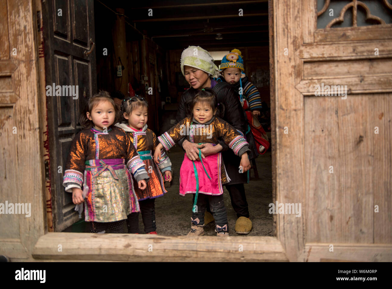 Children of Dong ethnic minority dressed in traditional clothes are ...
