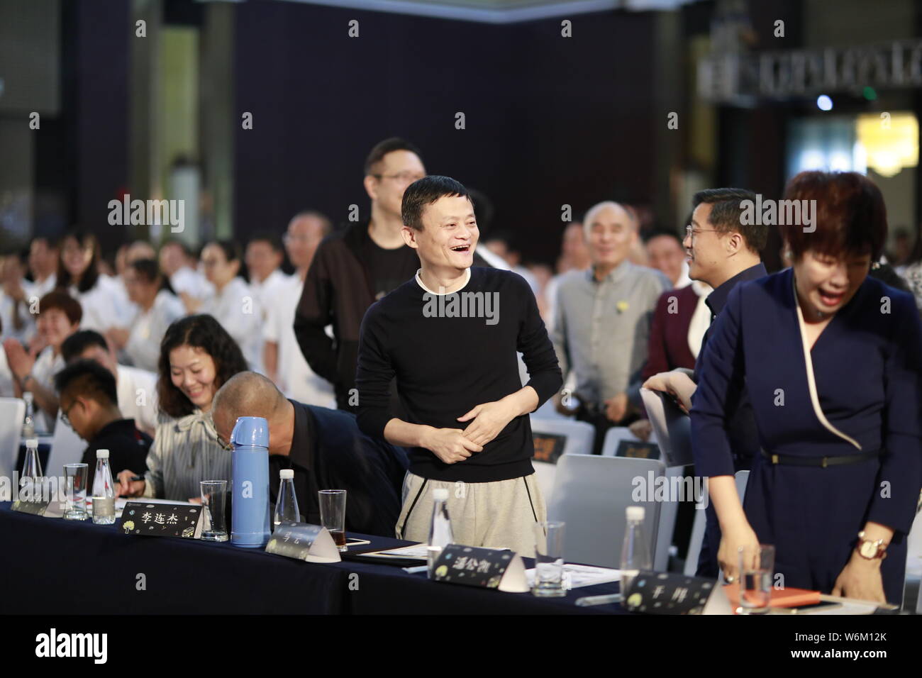Jack Ma Yun, center, Chairman of Alibaba Group, is pictured with rural ...