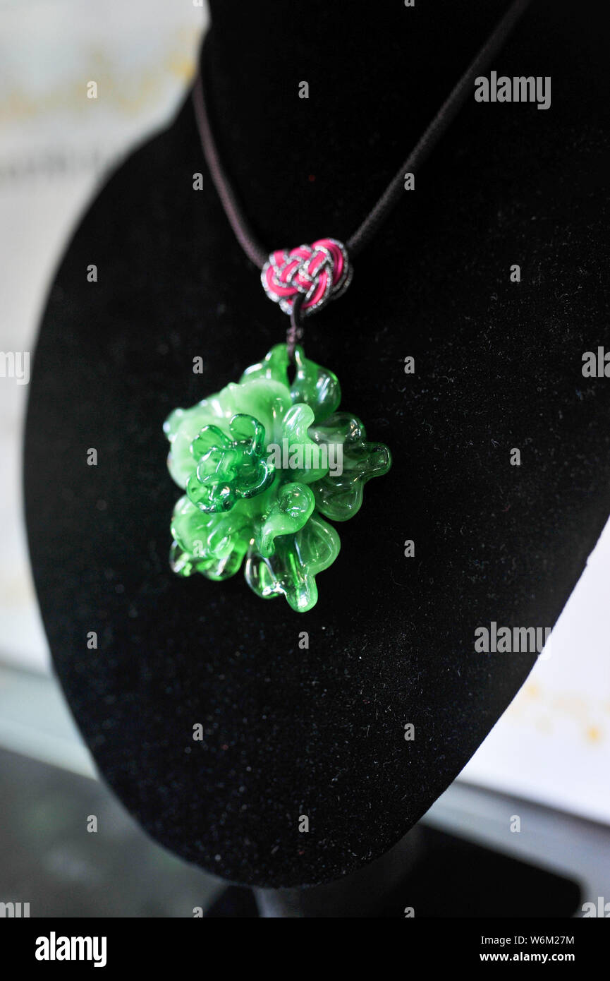 --FILE--A Liuli artwork, an ancient type of Chinese glass, is on ...