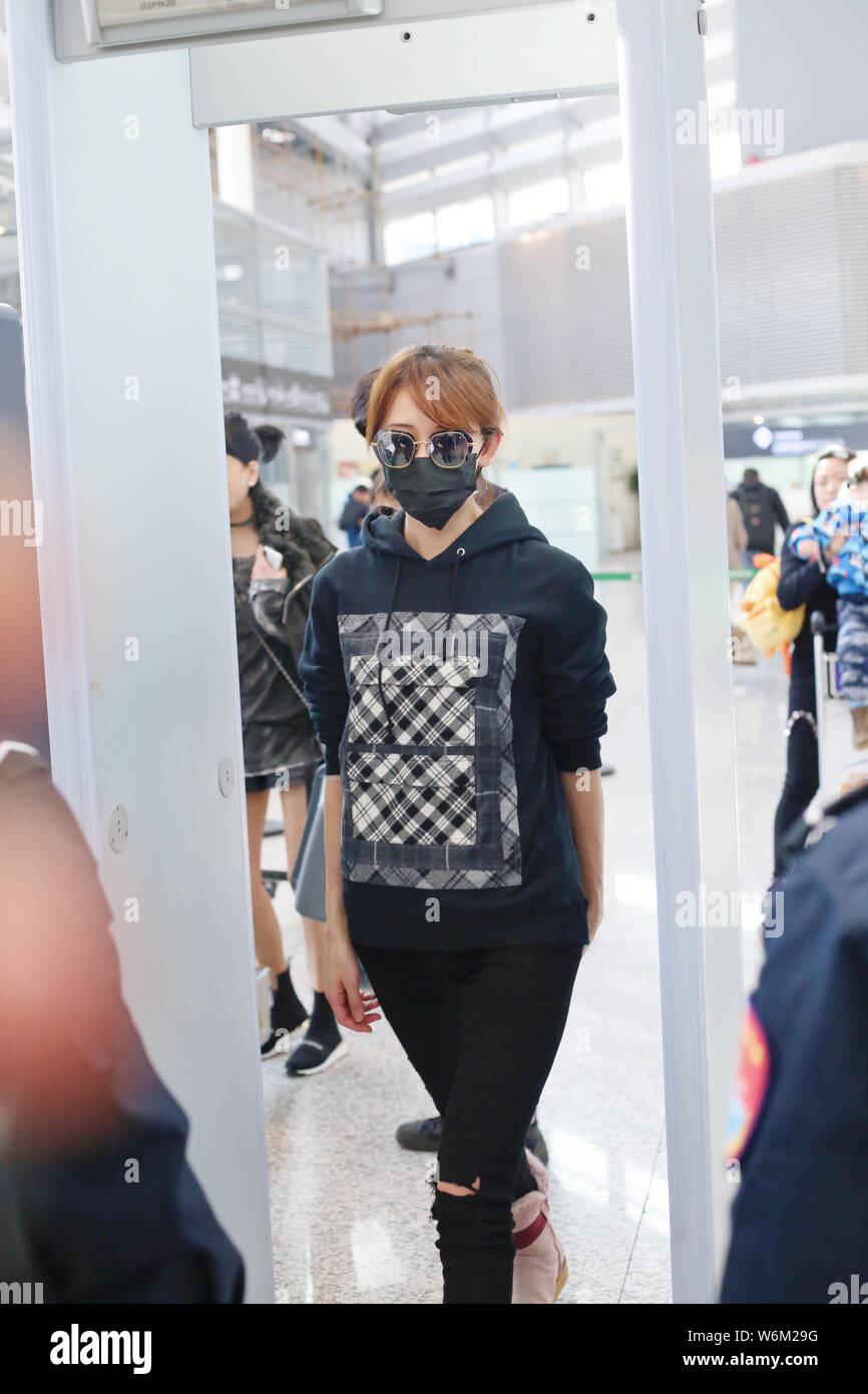 Taiwanese Model And Actress Lin Chi Ling Is Seen Wearing Sunglasses And Ripped Jeans At The