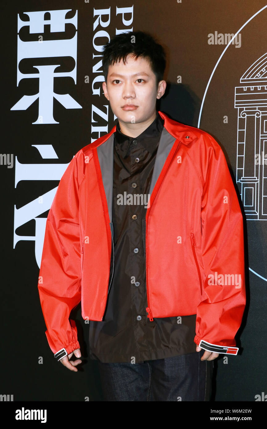 --FILE--Chinese rapper Wang Hao, better known as PG One, arrives for the opening party for Prada ...