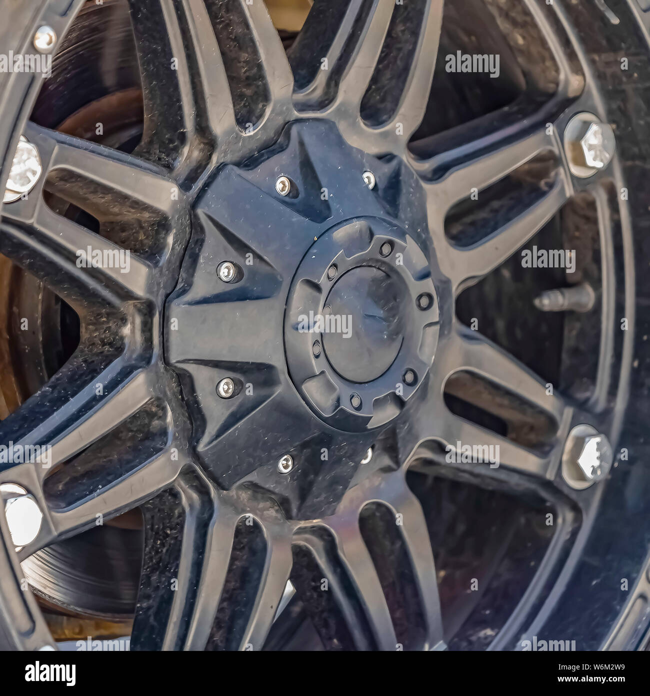 Close up view of the black rubber wheel of a vehicle Stock Photo - Alamy