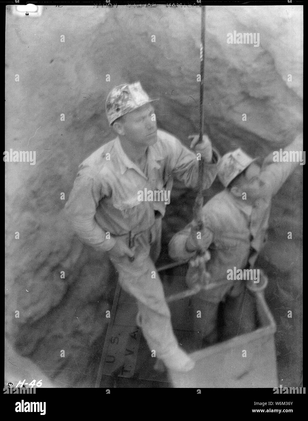 Shaftmen coming out of test shaft at Norris Dam site Stock Photo - Alamy