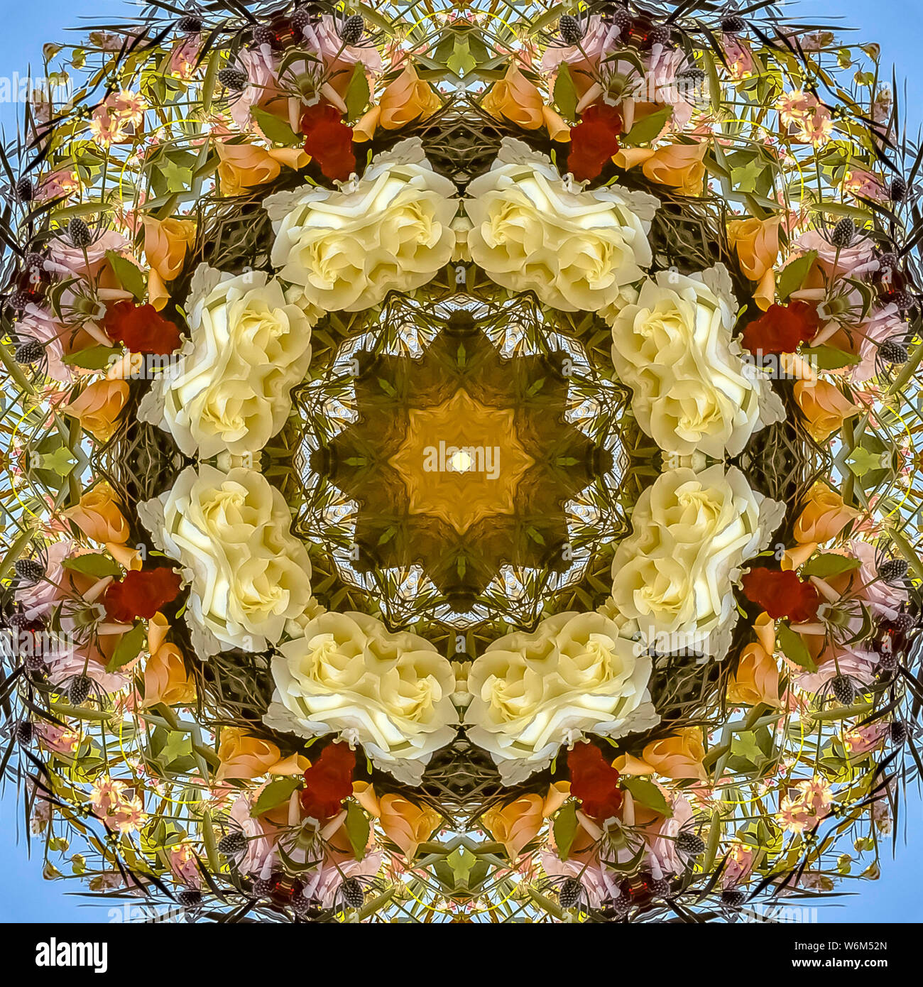 Muted yellow and white flowers in circular arrangement at wedding in ...