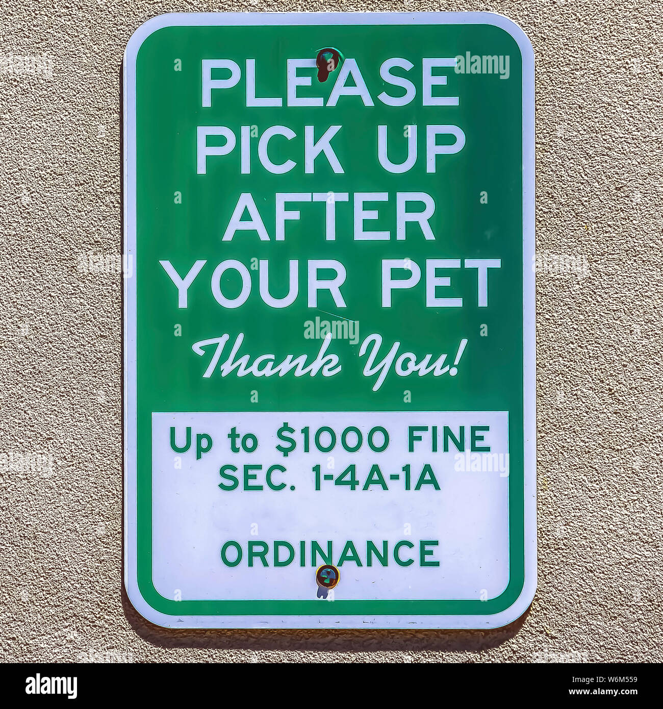 Pick up after your dog sign hi-res stock photography and images - Alamy