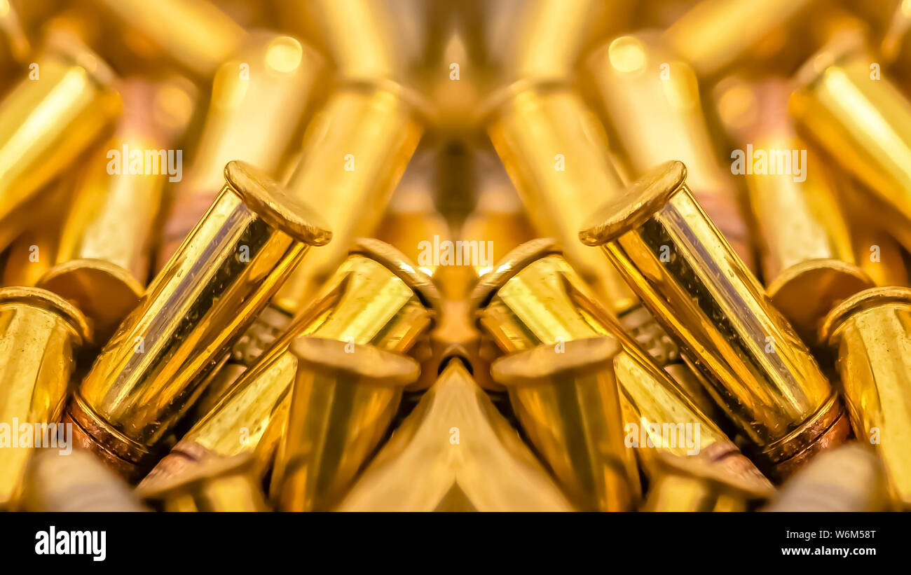 Panorama frame Pile of shiny bullets on an axis of symmetry Stock Photo ...