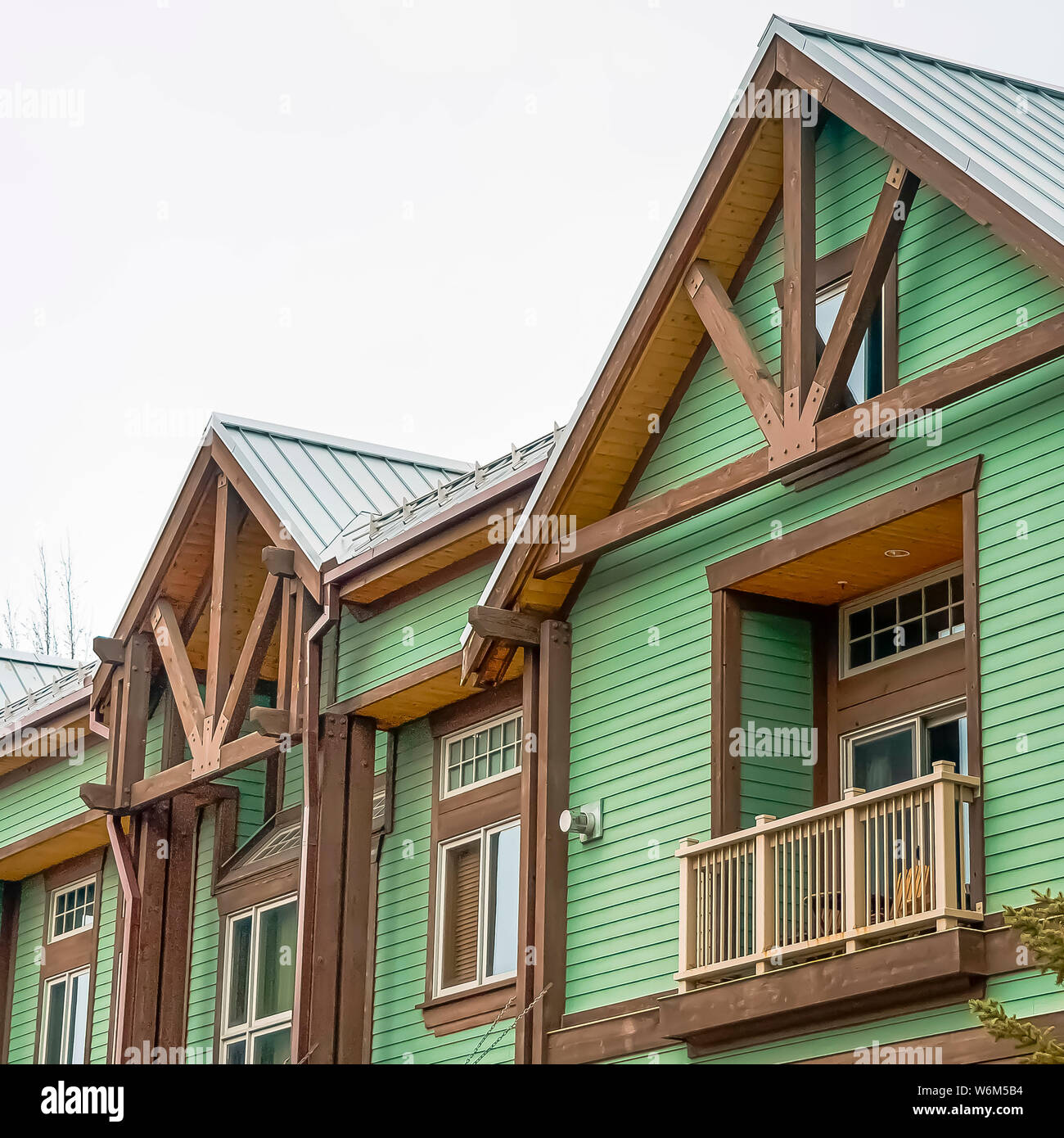 Square frame Exterior of the upper storey of homes with balconies and ...