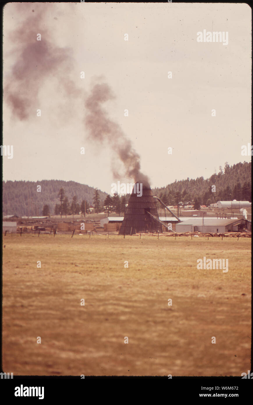 TEEPEE BURNER INCINERATES WOODCHIPS AND SAWDUST FROM LUMBER MILL Stock ...