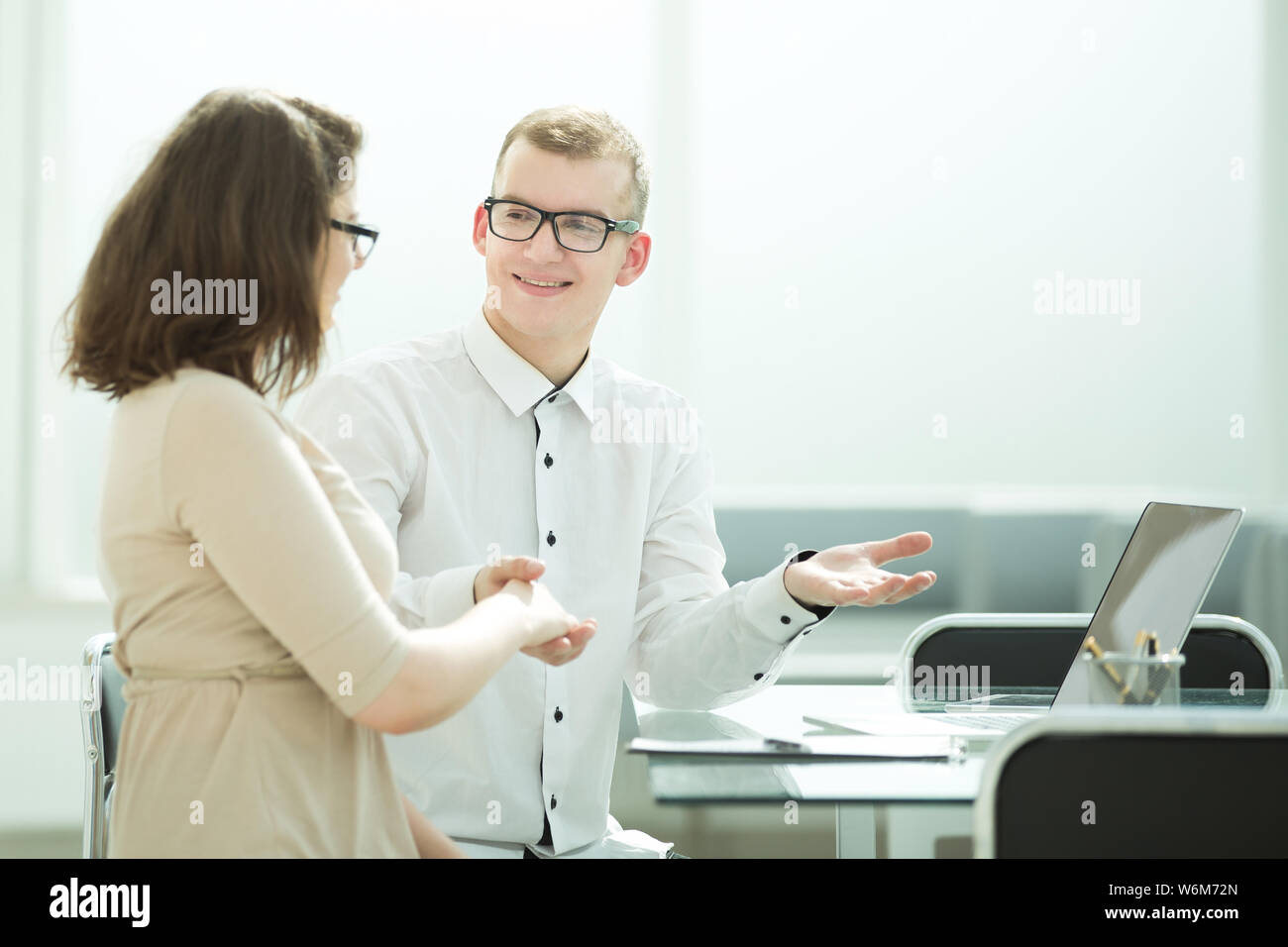 side view.handshake Manager and client at the office Desk. concept of ...