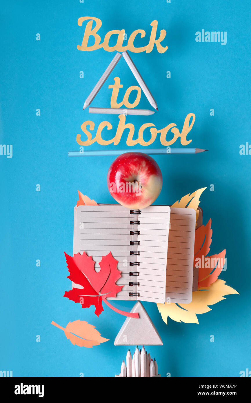 Back kto schooll, flat lay on dark texture background with stationary ...